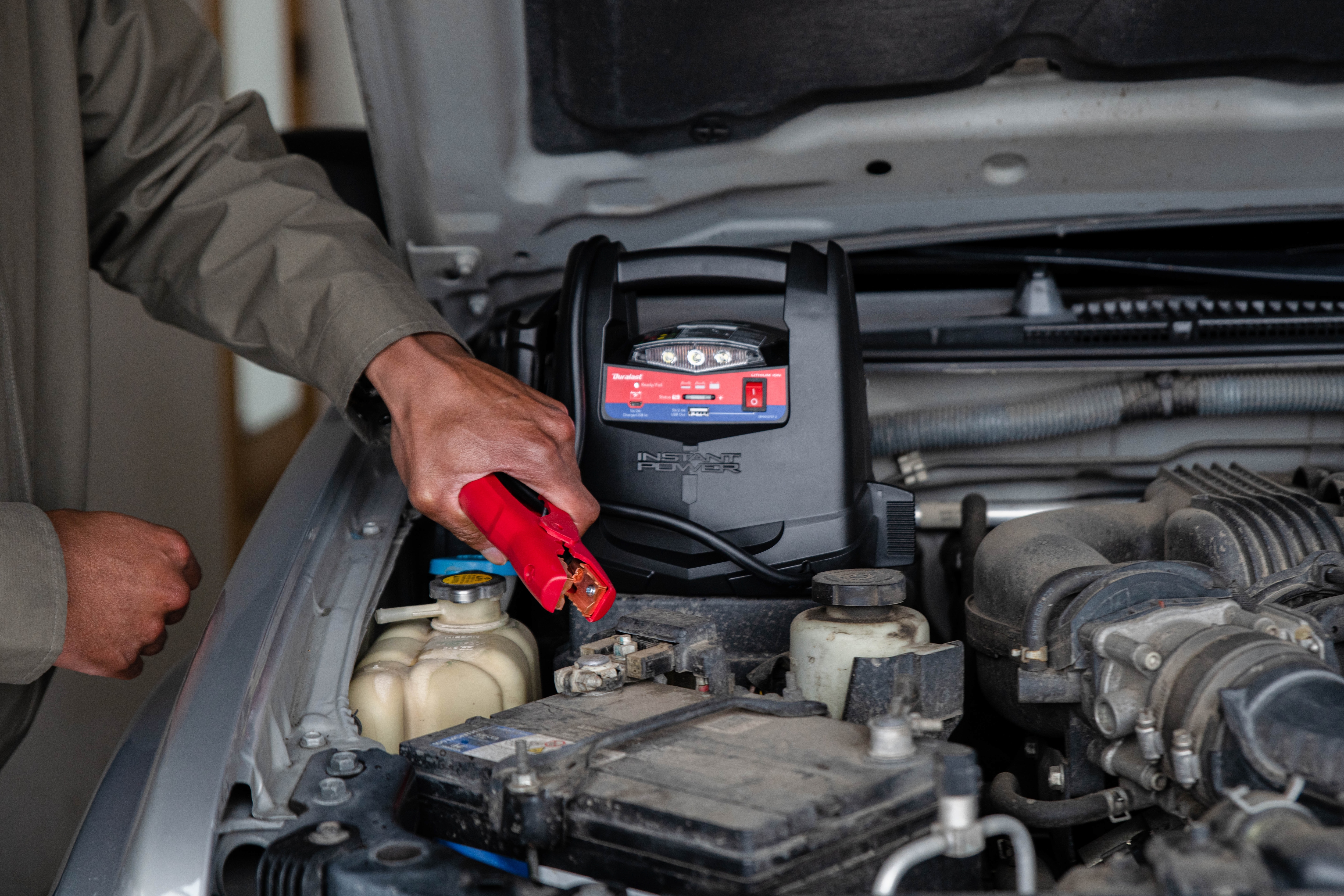 How to Jump Start a Dead Car Battery by Yourself—With or Without ...